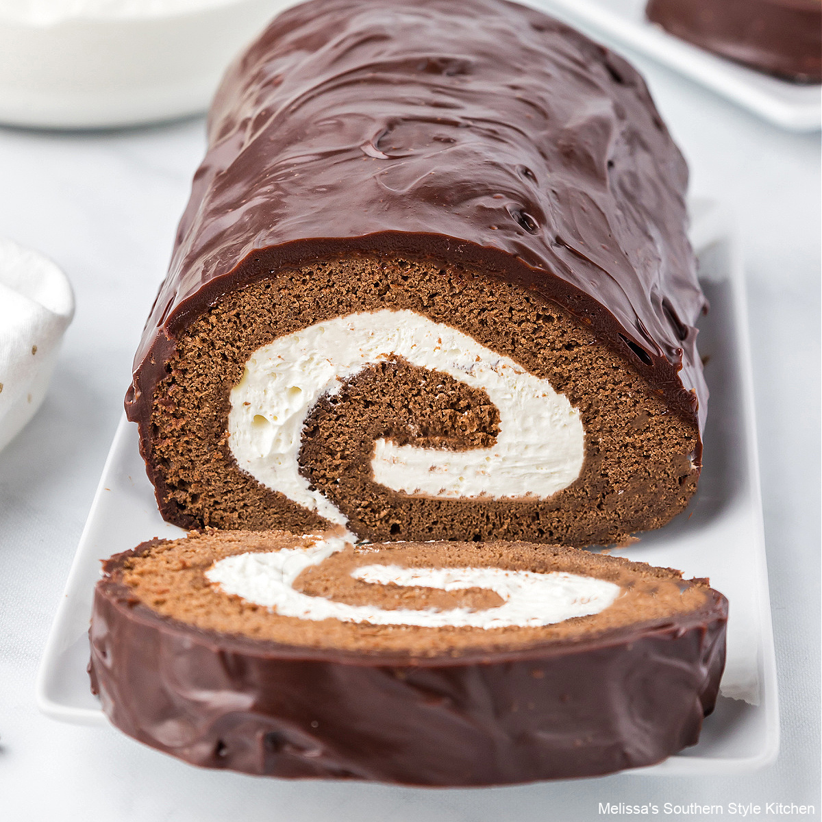 Chocolate Swiss Roll Cake - melissassouthernstylekitchen.com