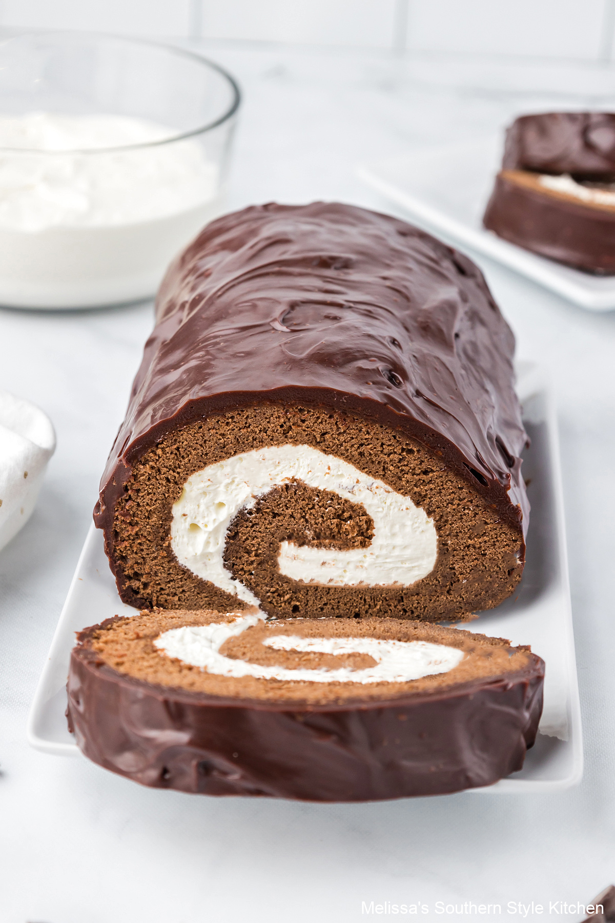 Chocolate Swiss Roll Cake - melissassouthernstylekitchen.com